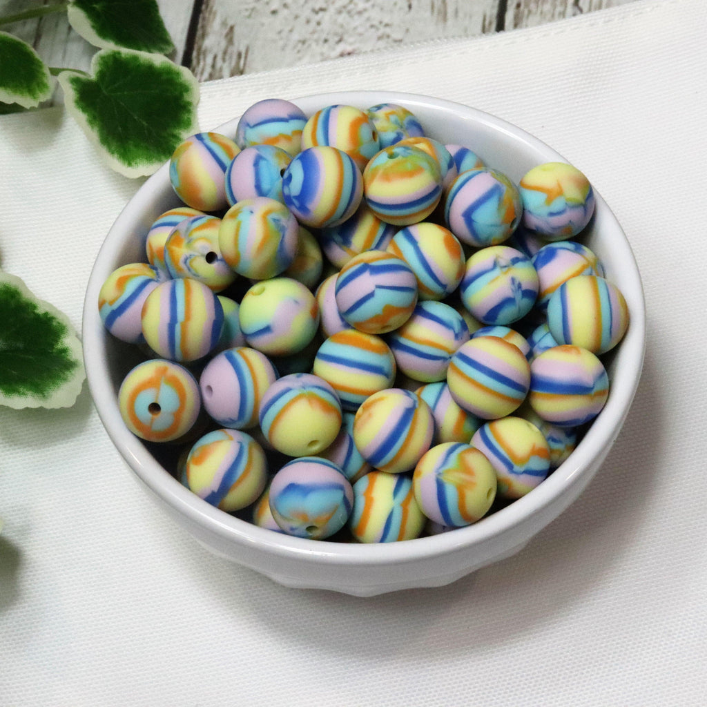 Check out our Rainbow Swirl | Loose silicone beads – Bella’s Bead Supply